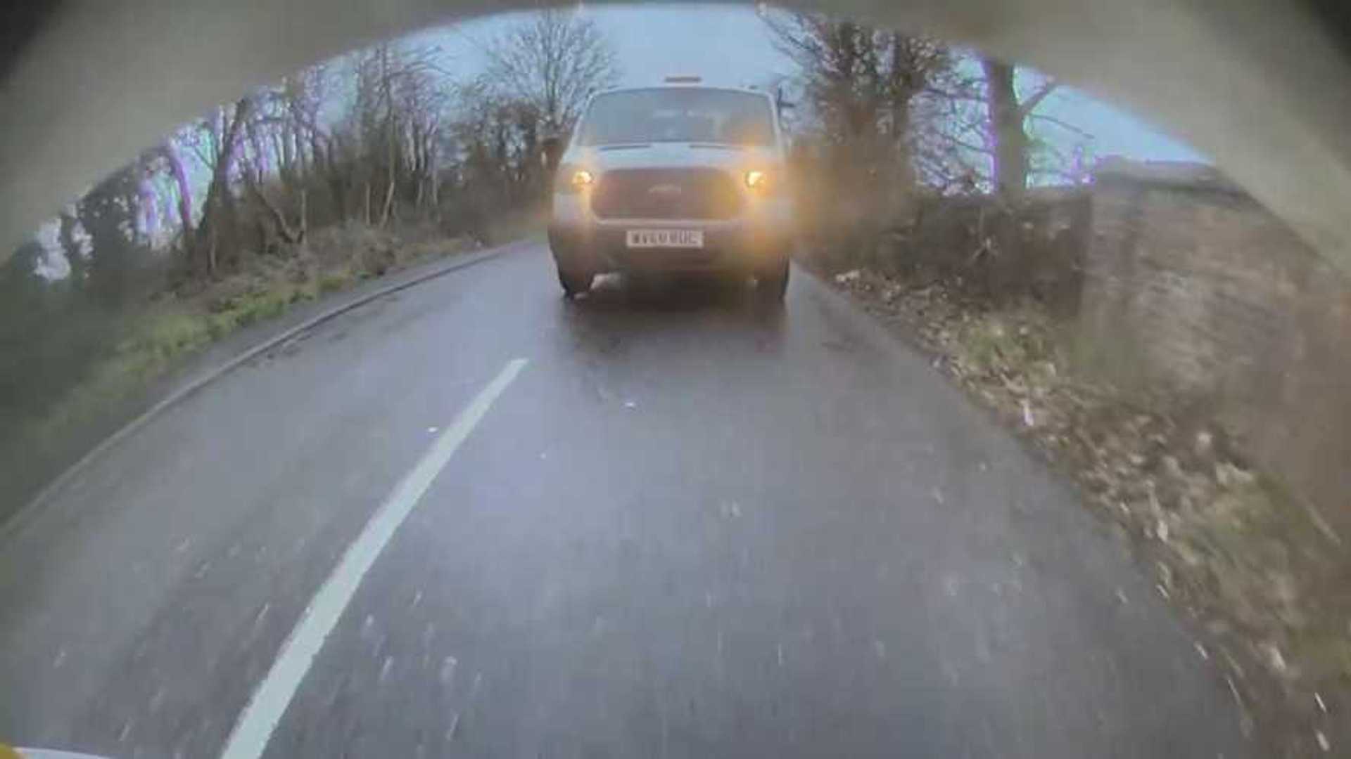 Flatbed Truck Tailgates Tesla Model 3, Runs Red Light In Oncoming Lane