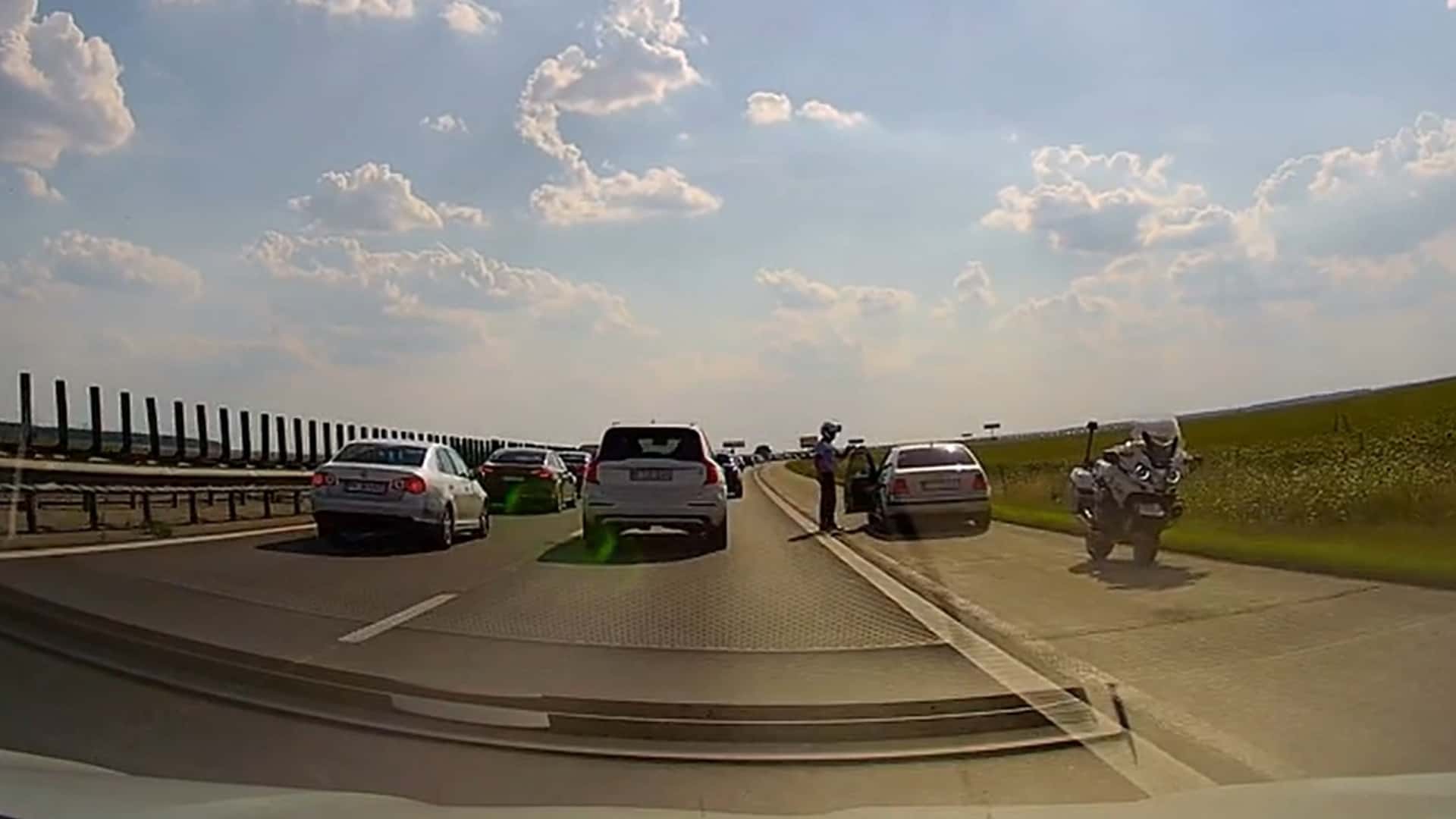 See Driver Passing Traffic Jam On Shoulder Get A Healthy Dose Of ...