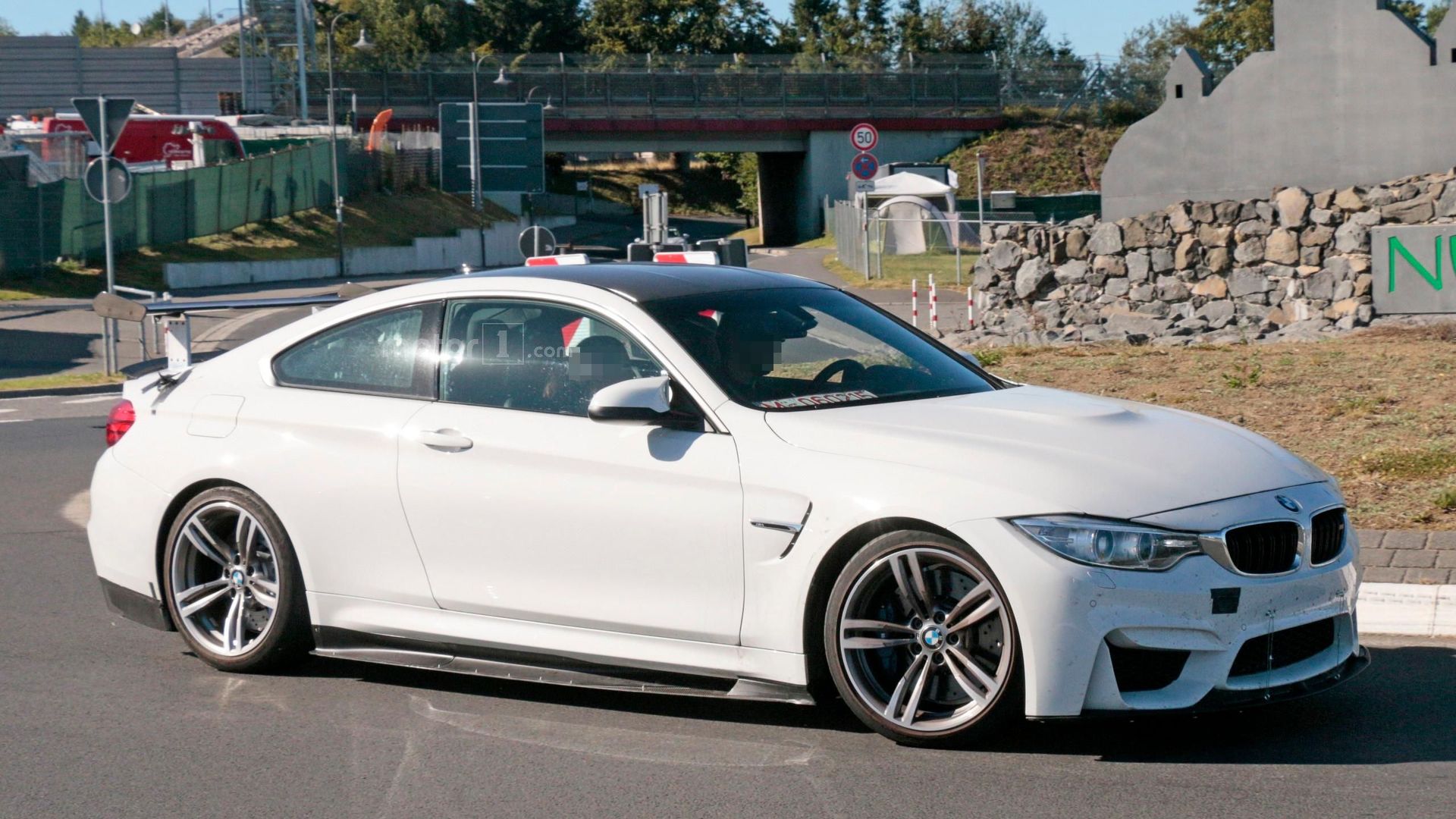 BMW M4 with aero upgrades caught on camera
