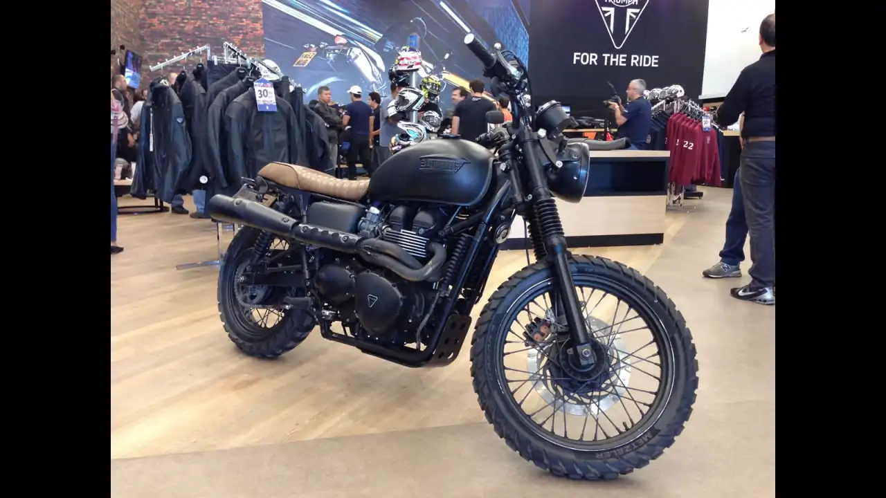 David Beckham Triomphe Moto