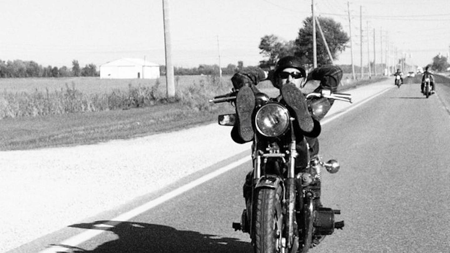 Crazy Canadian Stuntman Rides Full Tilt Under Farm Equipment