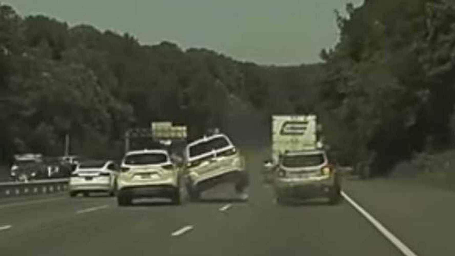 Merging Gone Wrong: Dodge Durango Flies By Tesla Model 3 Then Crashes
