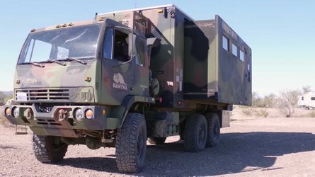 Military Truck With Extending Sides Becomes Camper With Solar Roof