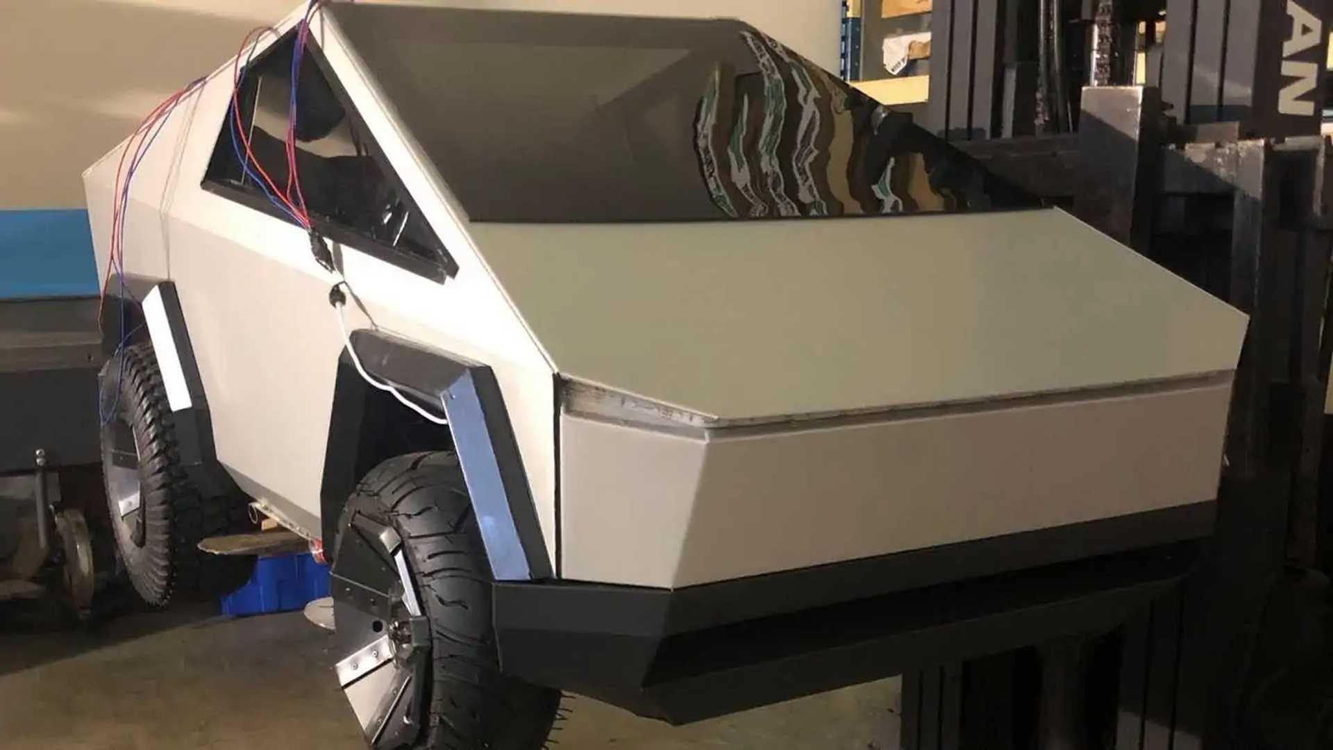 Watch Mini Tesla Cybertruck Win In Tug-Of-War Against Mercedes R-Class