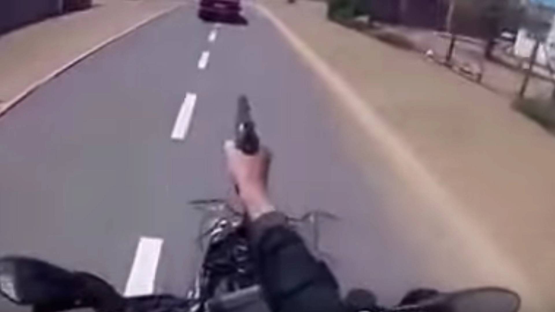 South African Motorcycle Cop Discharges Firearm During Chase - Video