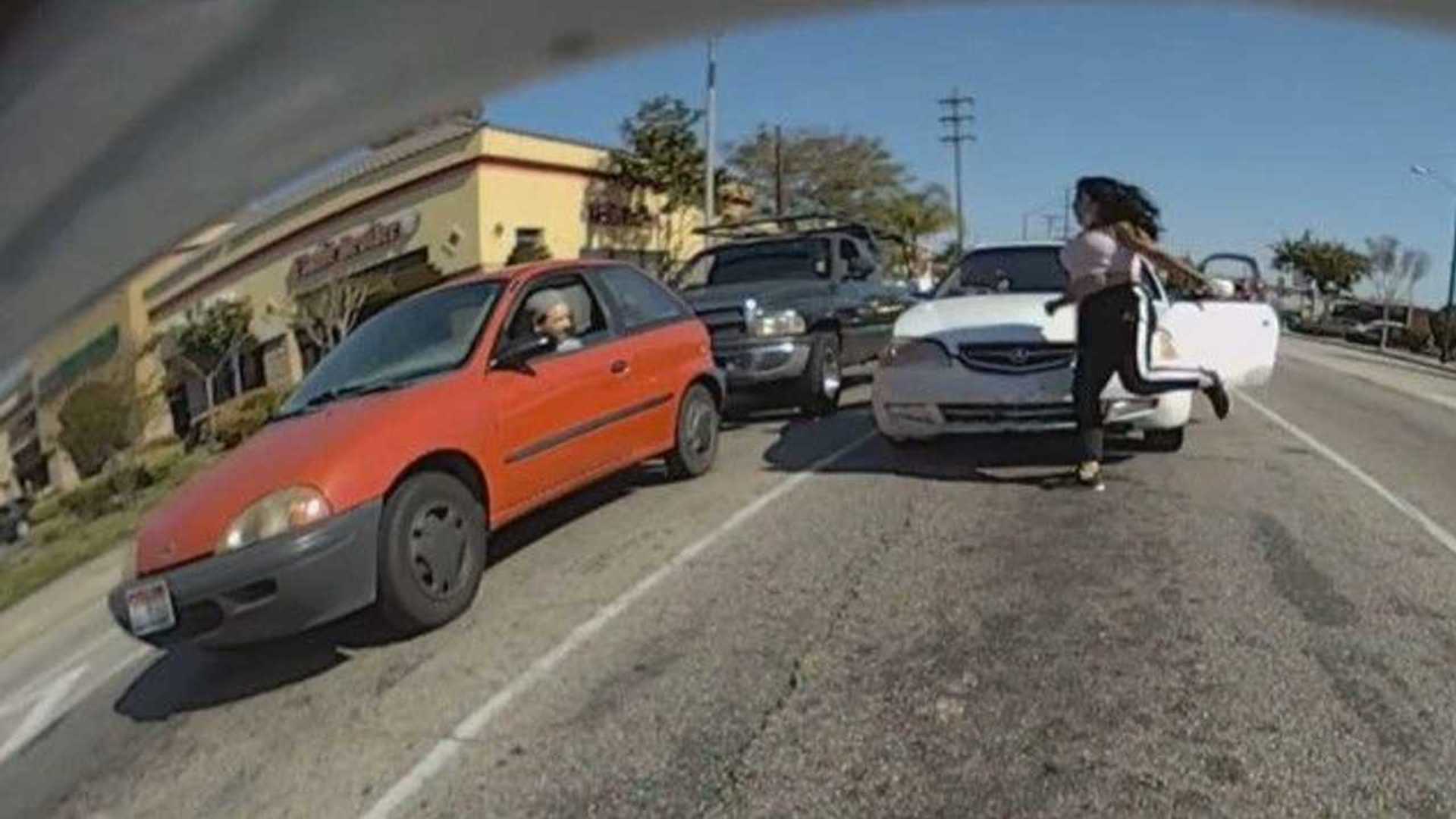 Watch Crazy Lady Karate Kicking Car Caught On TeslaCam